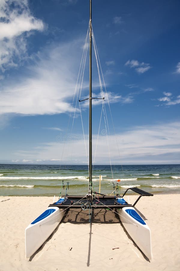 Catamaran on the beach stock image. Image of island, spar - 2325689