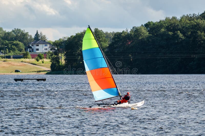 The Catamaran Floats on the Lake Stock Photo - Image of sail, game ...