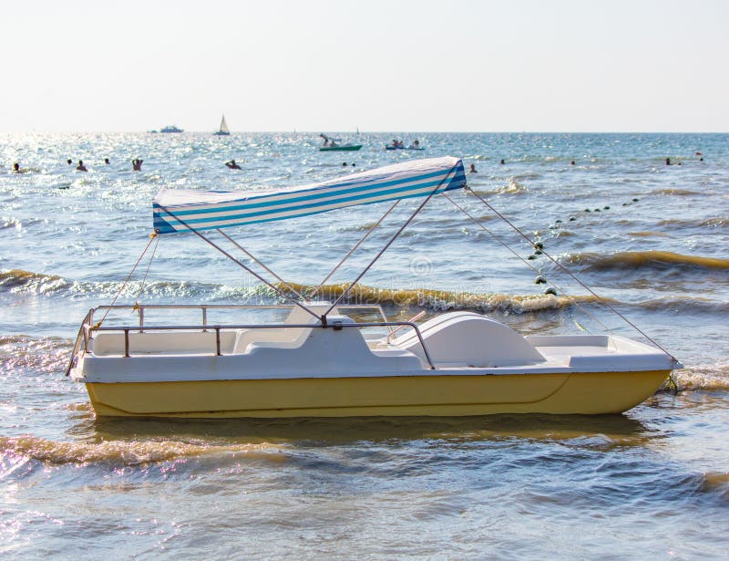 A Catamaran Floats on the Waves of the Sea Stock Image - Image of ...