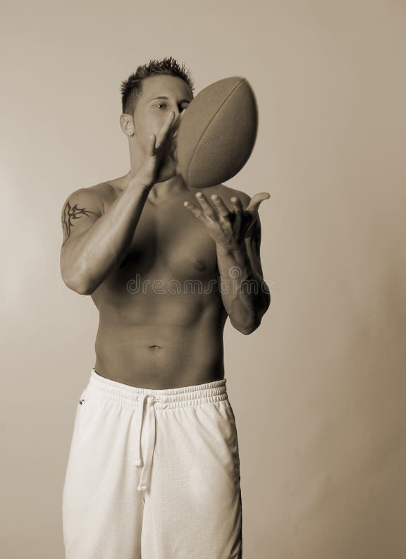 The catch stock image. Image of torso, pecs, chest, football - 630991