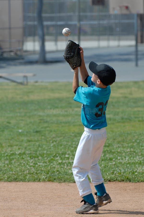 Boy Catching Ball stock photo. Image of childhood, close - 1218680