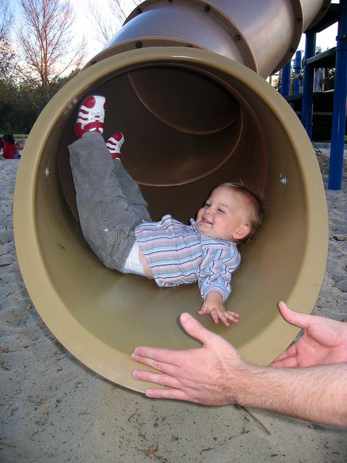 Catch Me stock photo. Image of sand, play, slide, caught - 13403302