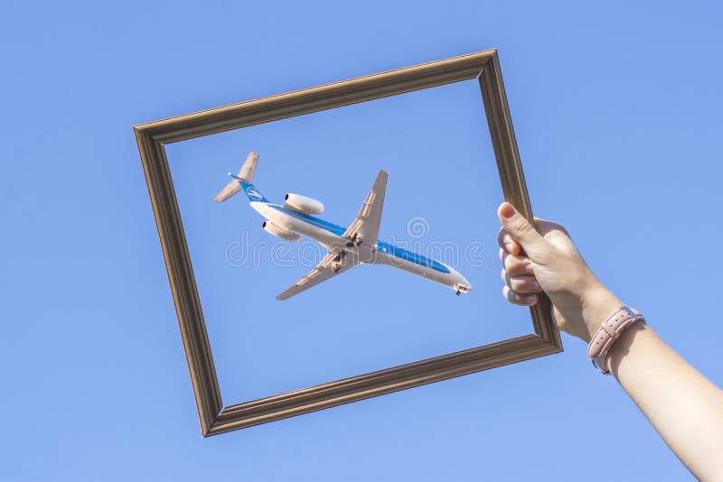 Catch a plane in a frame stock photo. Image of flying - 100810154