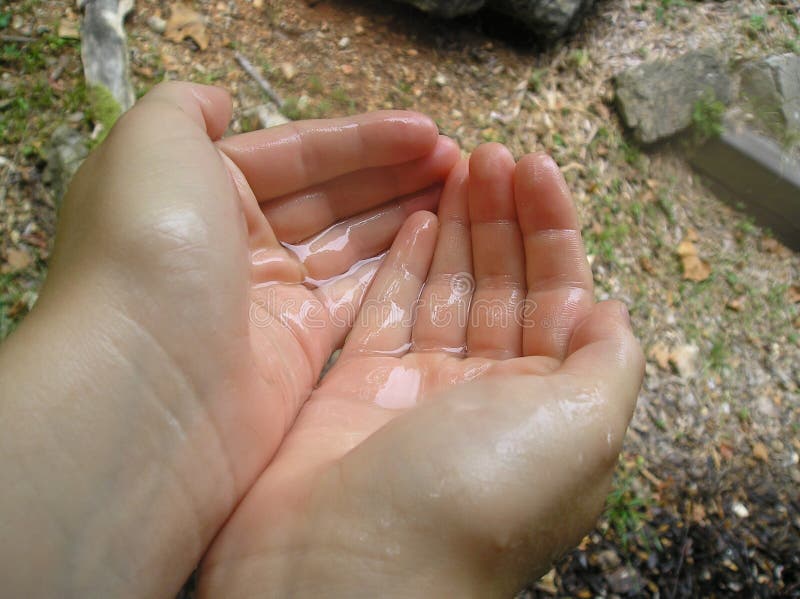 Catch a rain drop stock photo. Image of hand, drops, offer - 368256