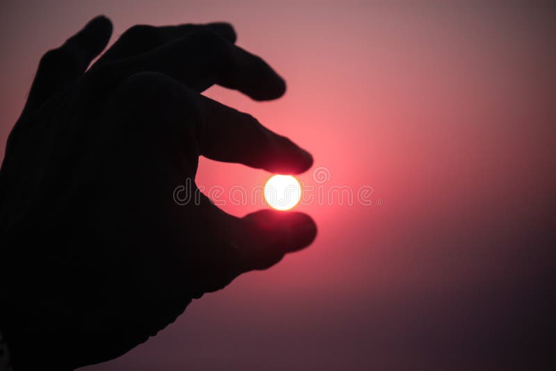 Catch the Sun stock photo. Image of sunrise, finger, darkness - 44606734