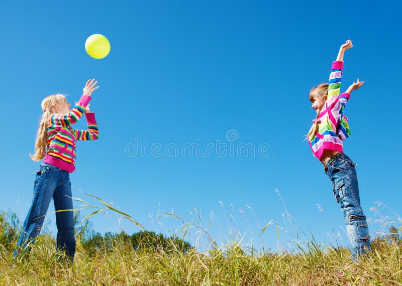 Catching the ball -2 stock image. Image of child, throwing - 1321163