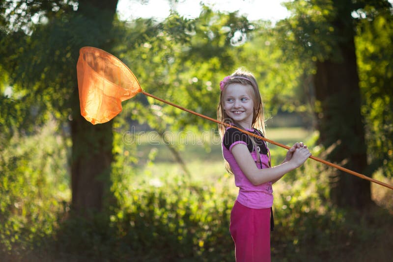 Catching butterflies stock image. Image of girl, summer - 21143999