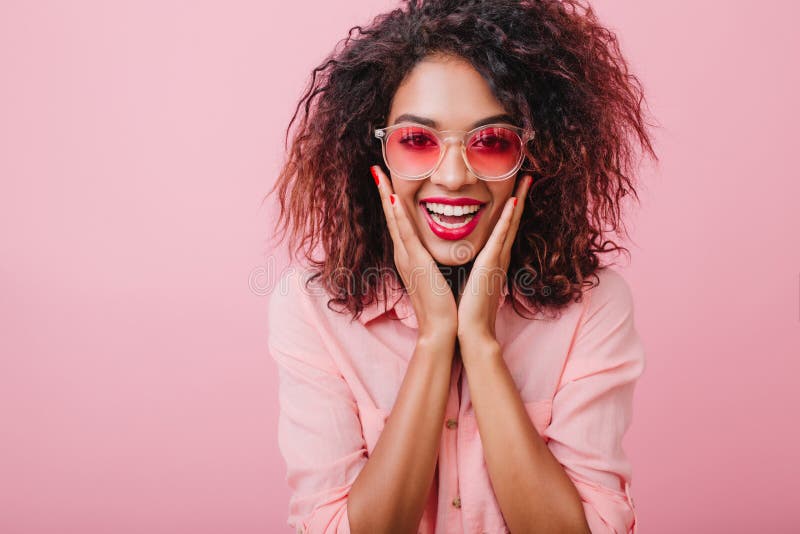 Catching Curly Girl In Trendy Sunglasses Chilling During Photoshoot And
