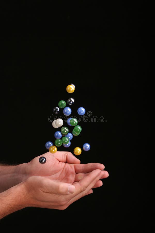 Marbles falling in water. stock photo. Image of moment - 4166234
