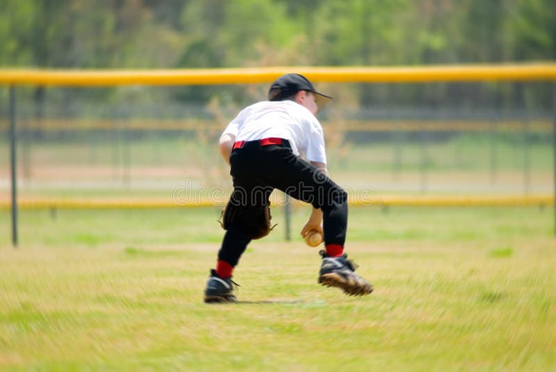 Catching Ground Ball/Blur stock photo. Image of youth - 4942742