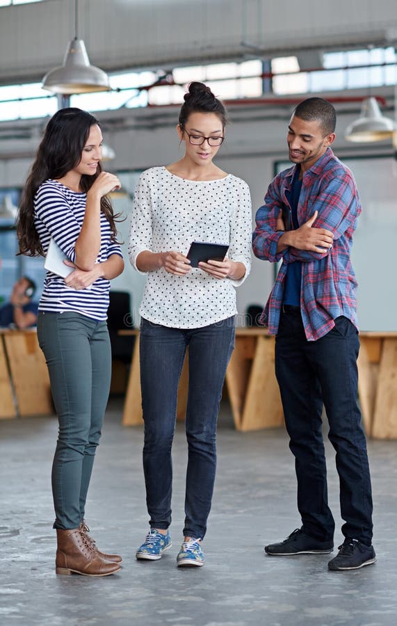 Catching the Latest Updates. Full Length Shot of Creative People ...