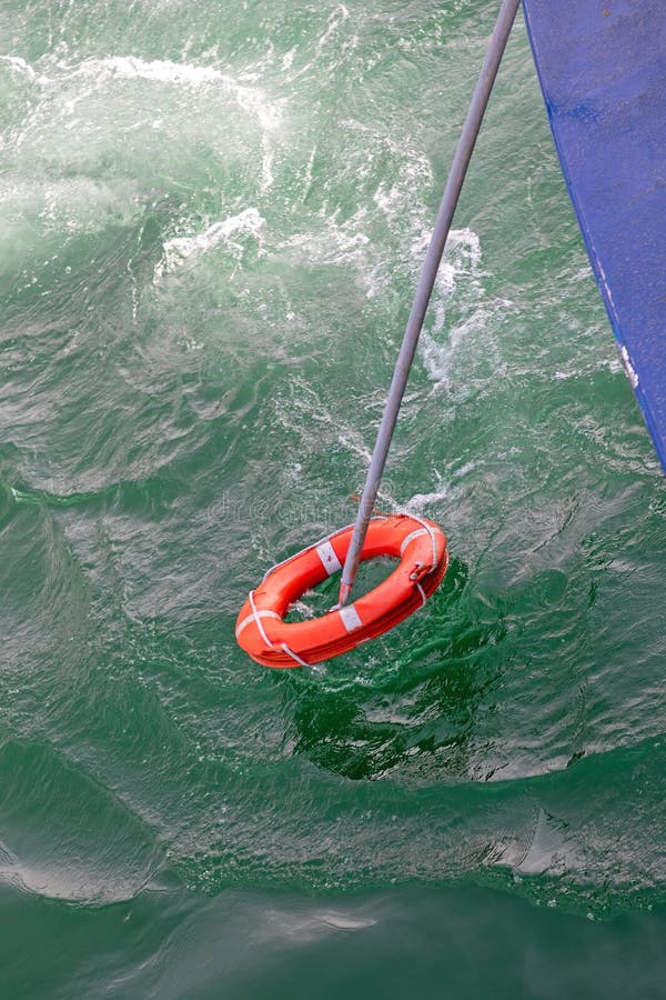 Catching Life Ring stock photo. Image of safety, drowning - 161370696