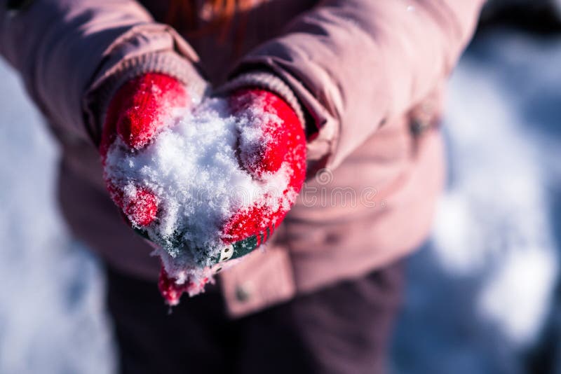 Catching Snow with Hands with Red Woolen Gloves on a Winter Day Stock ...