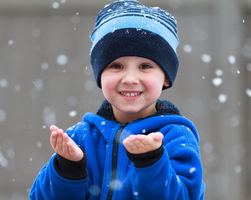 Catching snowflakes stock photo. Image of preschooler - 22982044