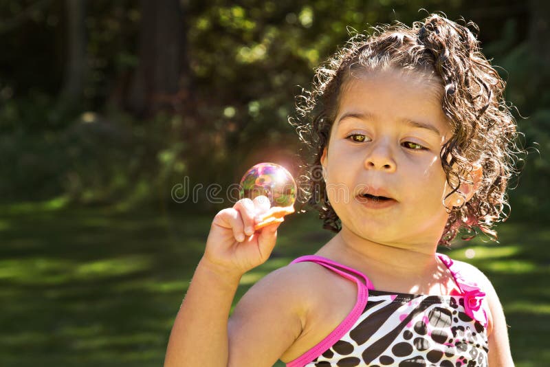 Catching the Sun in a Bubble Stock Image - Image of print, caucasian ...