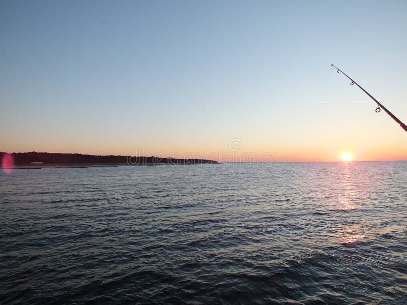 Catching the sun stock image. Image of horizon, fishing - 97621523