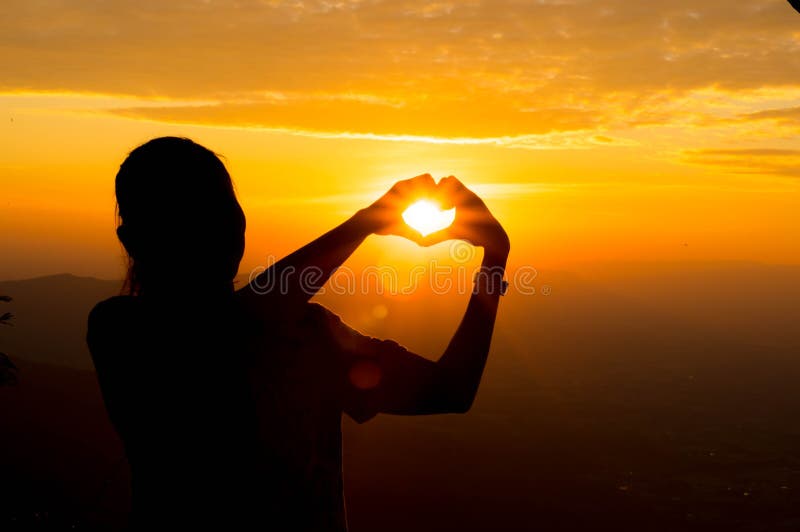Catching the Sun stock image. Image of sunset, silhouette - 91455147