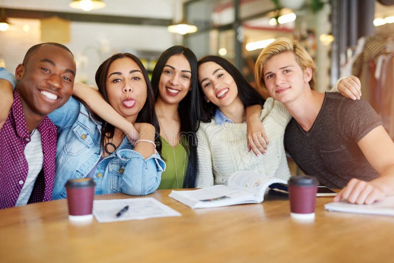 Catching Up in the Cafeteria. Portrait of a Group of Happy Students ...