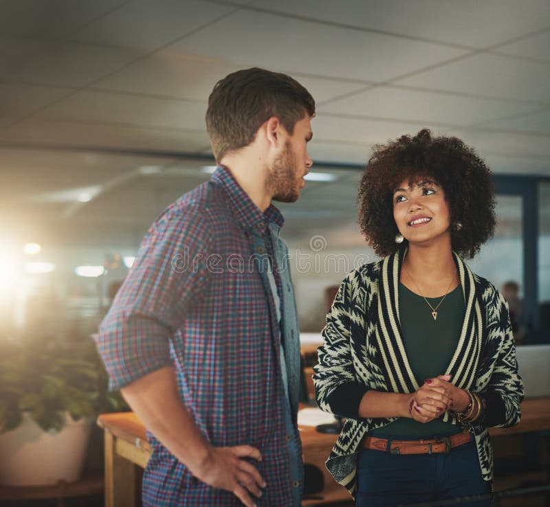 Catching Up with Her Favorite Colleague. Colleagues Talking in a Modern ...