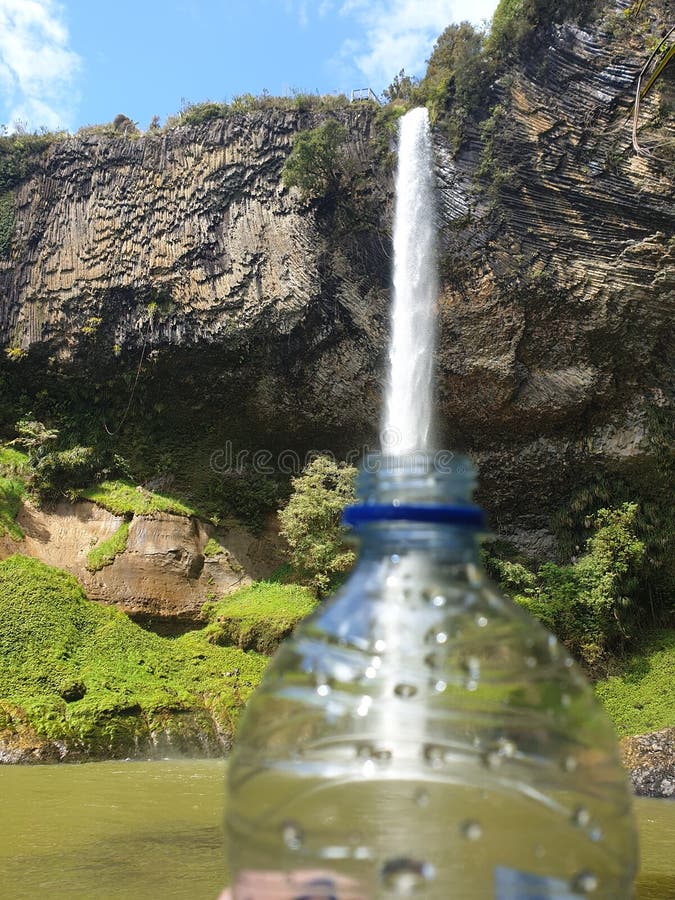 Catching Waterfall in a Bottle Stock Photo - Image of travel, bottle ...