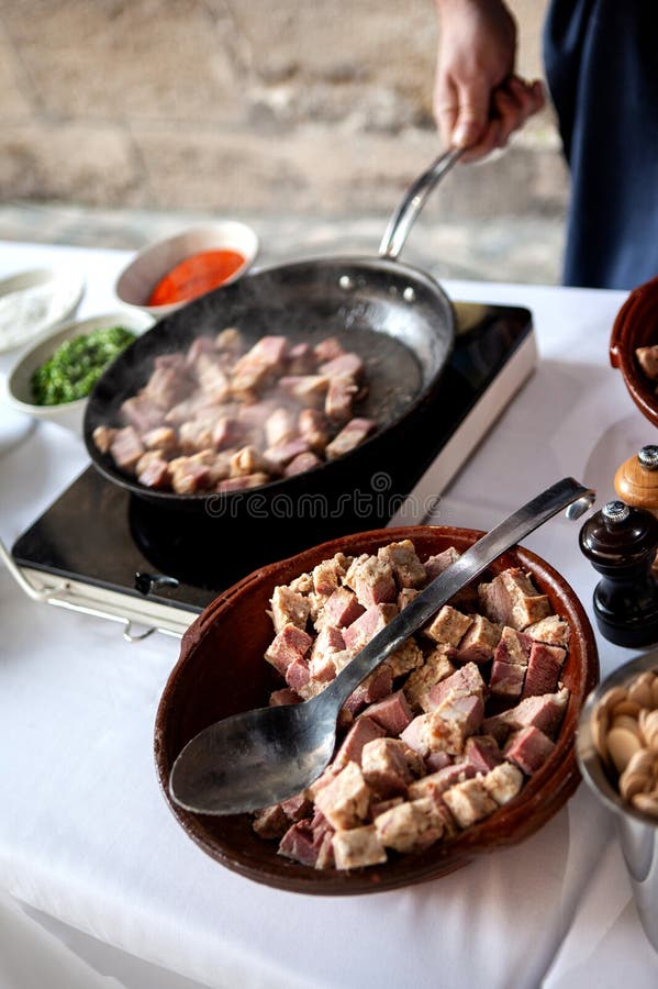 The Caterer is Cooking on the Buffet Stock Image - Image of caterer ...