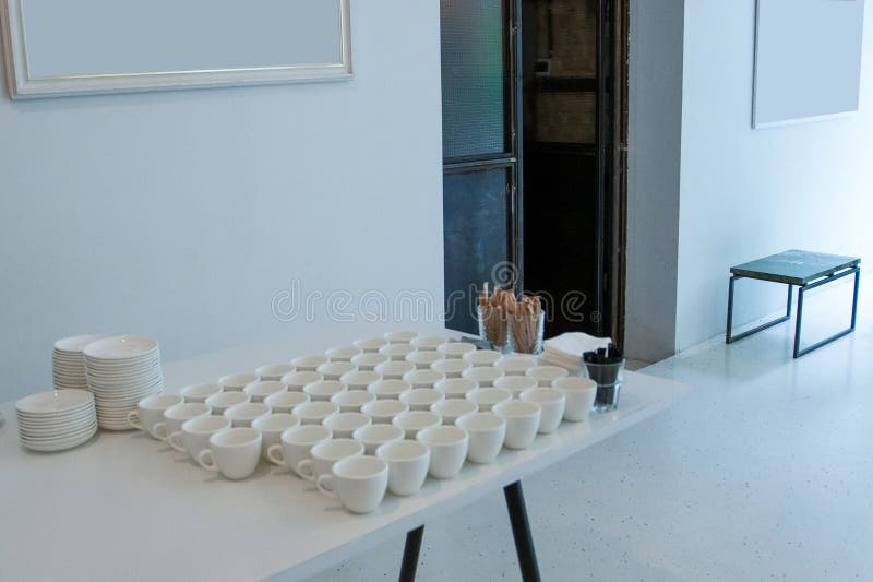 Catering - Buffet at the Event. Table with White Cups for Coffee and ...