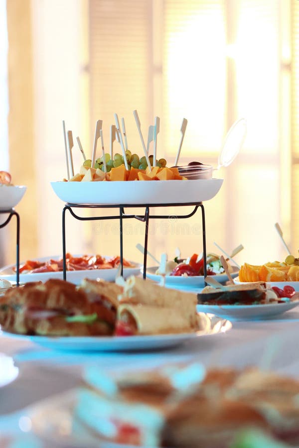 Catering Buffet Table with Snacks and Appetizers. Various Light Snacks ...