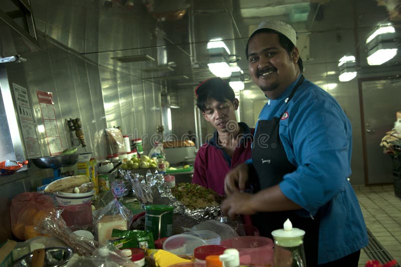 Smiling Catering Crew in Galley Editorial Photo - Image of commencing ...