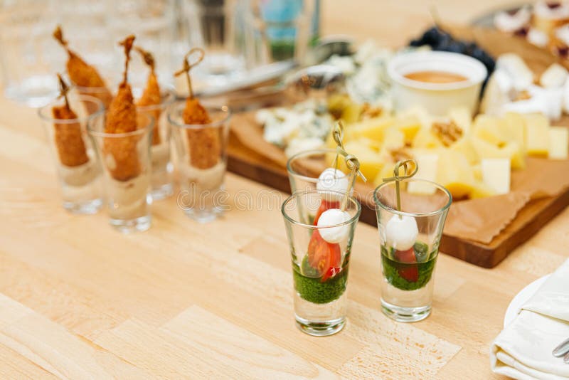 Catering, Food and Drinks Concept - Different Appetizers in Glass Shots ...