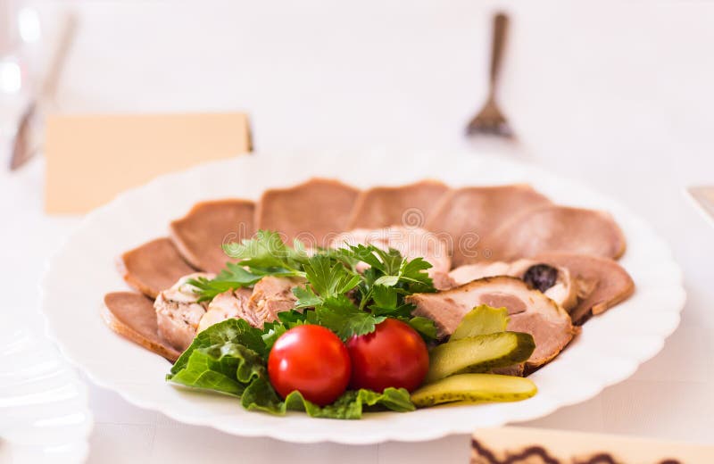 Catering Platter of Sliced Cured Meat and Ham with Vegetable Decoration ...