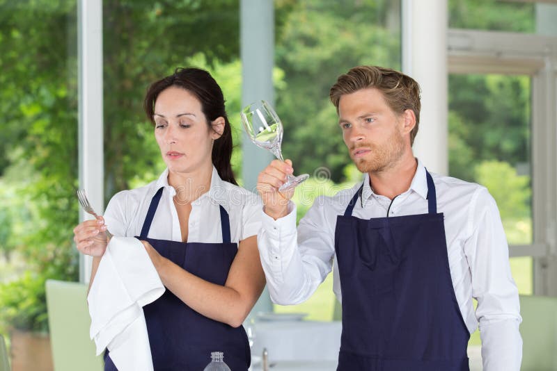 Catering Restaurant Waitress and Waiter Setting Table Stock Photo ...