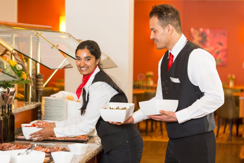 Catering Service Employees Filling Buffet in Restaurant Stock Image ...