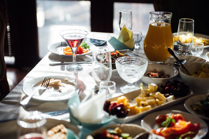 Bartender at Counter with Bottles and Glass of Whiskey in Bar, Closeup ...