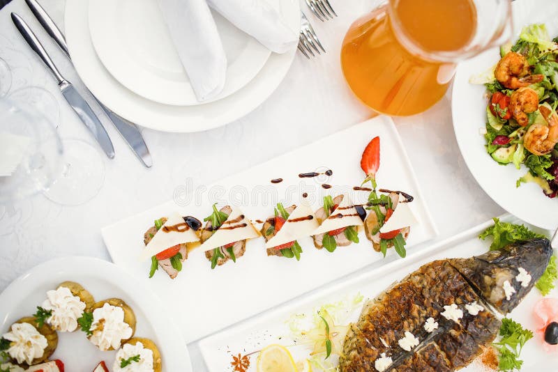 Catering Table Set Service with Silverware and Glass Stemware at Stock ...