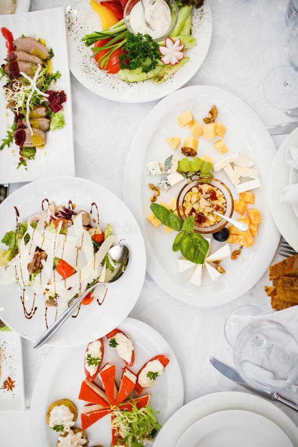 Catering Table Set Service with Silverware and Glass Stemware at Stock ...