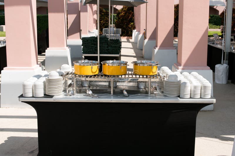 Catering Table with Yellow Pots Stock Image - Image of silverware ...