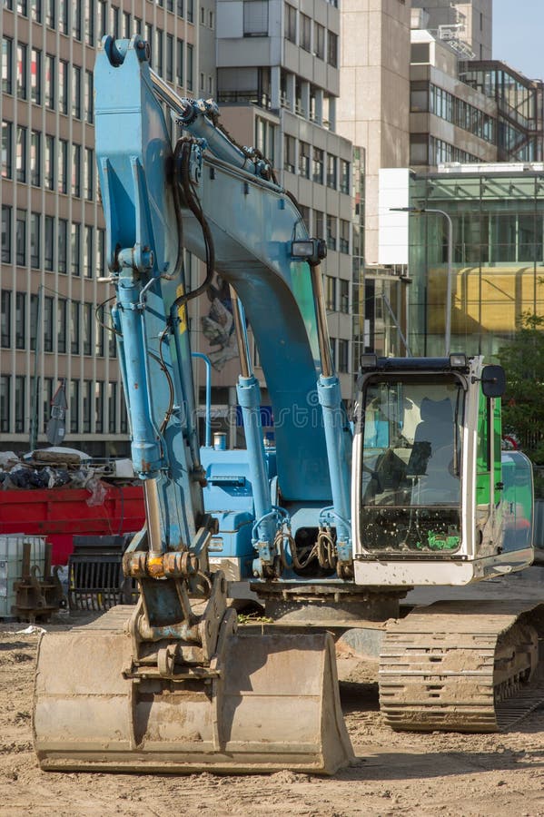 Blue caterpillar excavator stock photo. Image of loader - 143997608