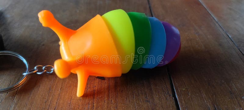 A Caterpillar-shaped Keychain with Bright and Attractive Colors Stock ...