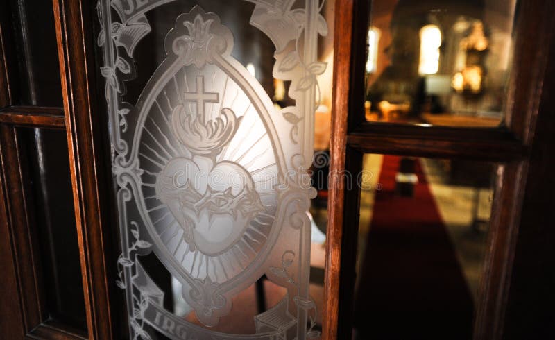Catholic Church Door with Sacred Heart Stock Photo - Image of heart ...
