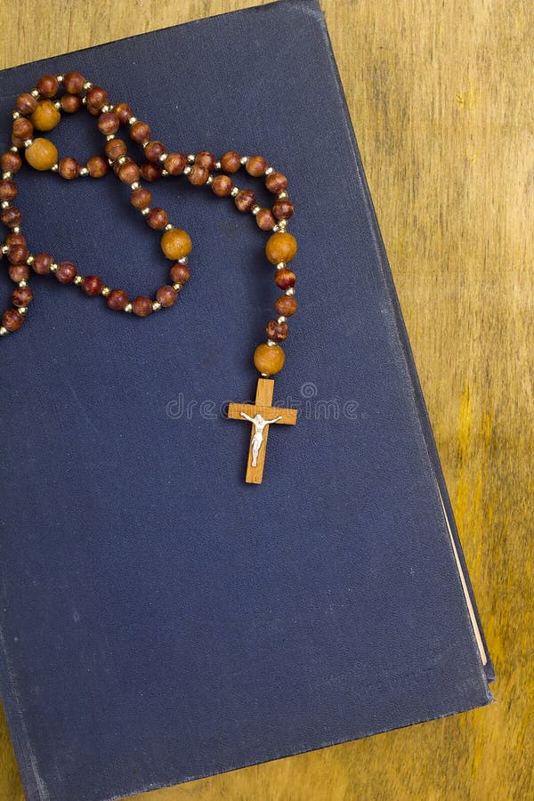 Catholic cross on the book stock photo. Image of paper - 67134644