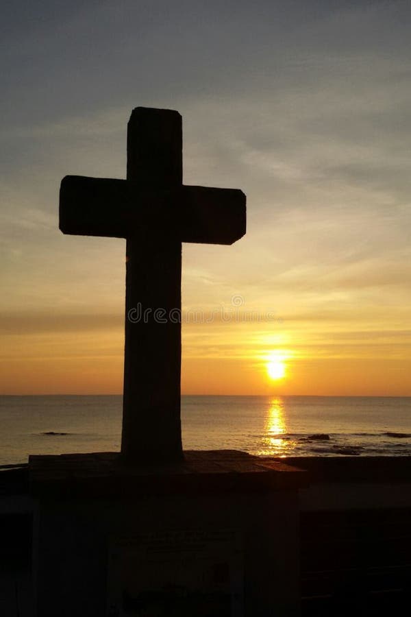 Catholic Cross in Front of a Sunset Stock Photo - Image of sunset ...
