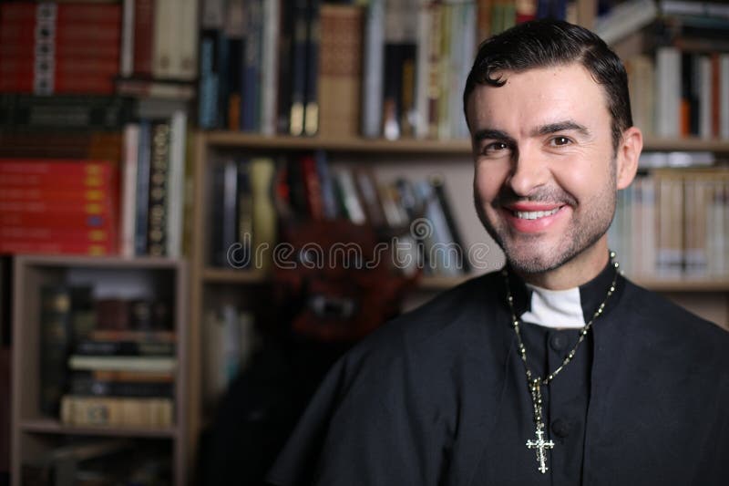 Catholic Priest in a Library Stock Image - Image of clergyman ...