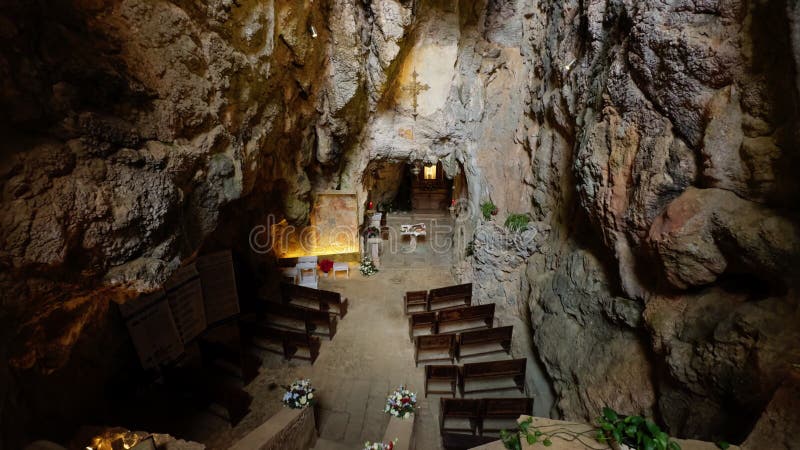 Catholic Sanctuary in a Old Cave Stock Footage - Video of christianity ...