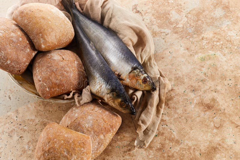 Catholic Still Life of Five Loaves of Bread and Two Fish Stock Photo ...