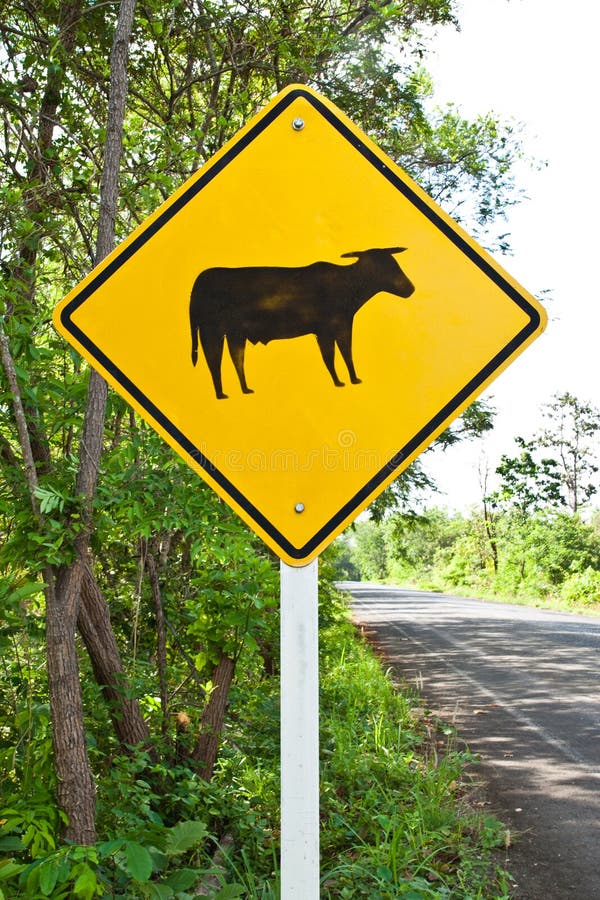 The Cattle crossing Sign stock photo. Image of icon, tree - 19473602