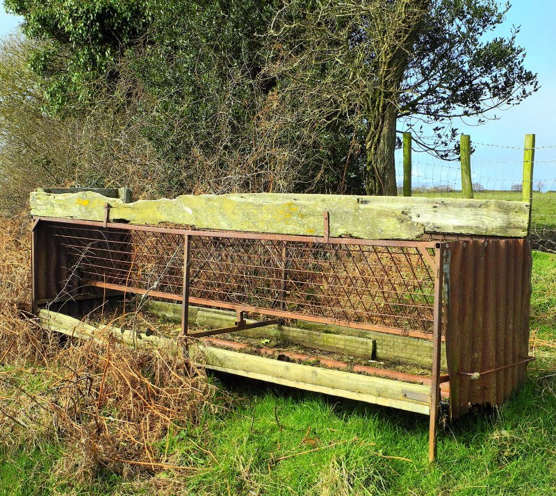 Cattle feeding box stock image. Image of fence, disused - 52419705