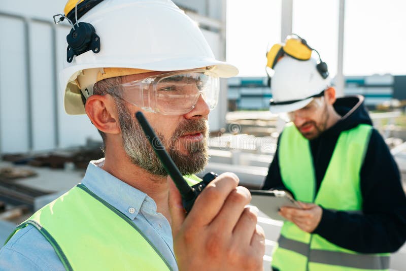 Caucasian Bearded Engineer with Walkie-talkie Control Working Process ...