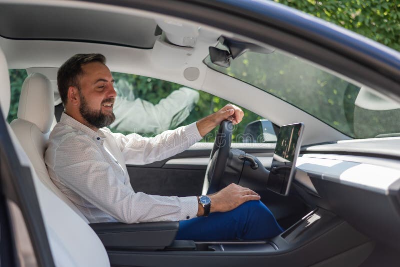 Caucasian Bearded Man in a Suit Driving a Car. Stock Image - Image of ...