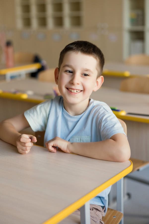 Caucasian boy in classroom stock image. Image of schoolboy - 365536533