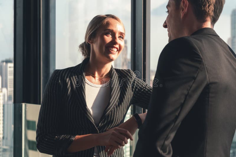 Caucasian Business Couple Having Business Conversation Together in ...